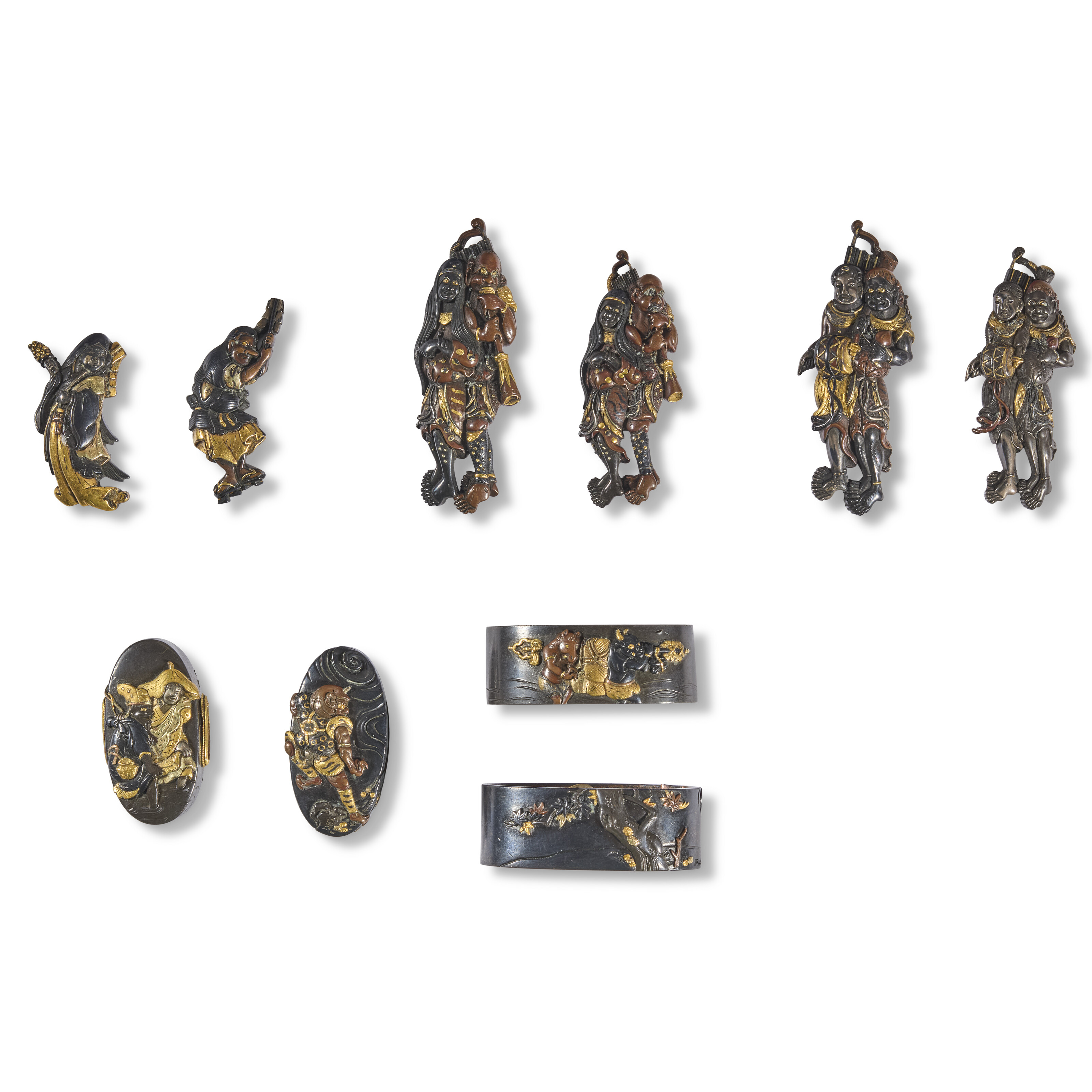 A GROUP OF TEN MIXED-METAL SWORD FITTINGS, JAPAN, EDO-MEIJI PERIOD ...