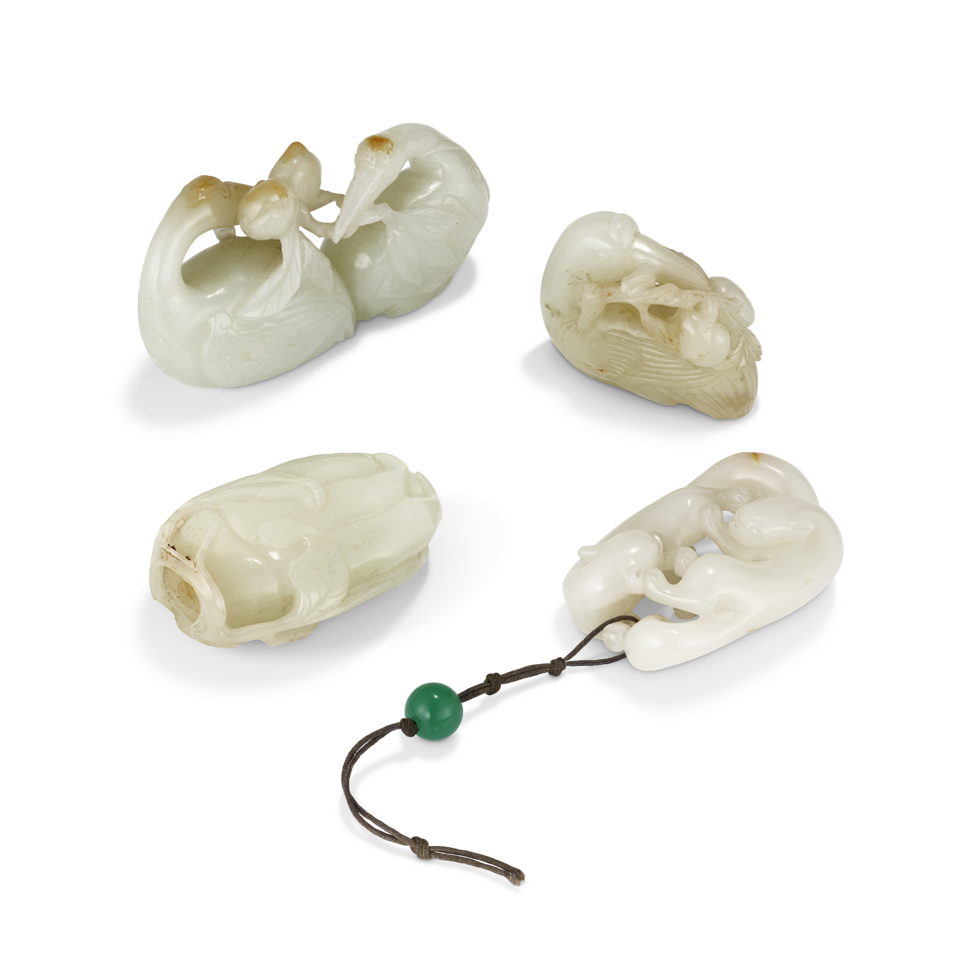 TWO PALE CELADON JADE CARVINGS OF A TWIN CRANE AND A CRANE, A WHITE ...