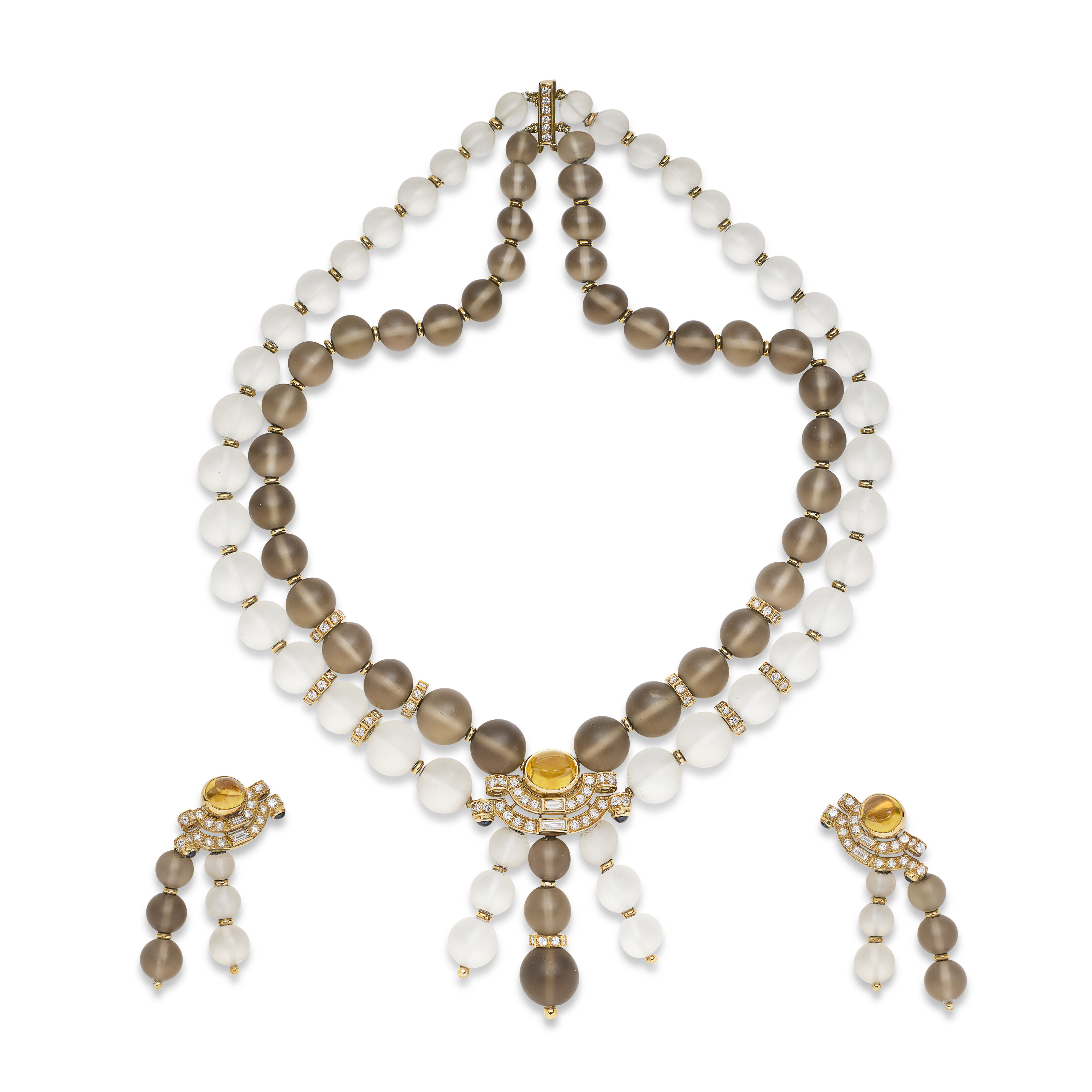BOUCHERON DEMI-PARURE QUARTZ FUMÉ, CRISTAL DE ROCHE, SAPHIRS DE COULEUR ...