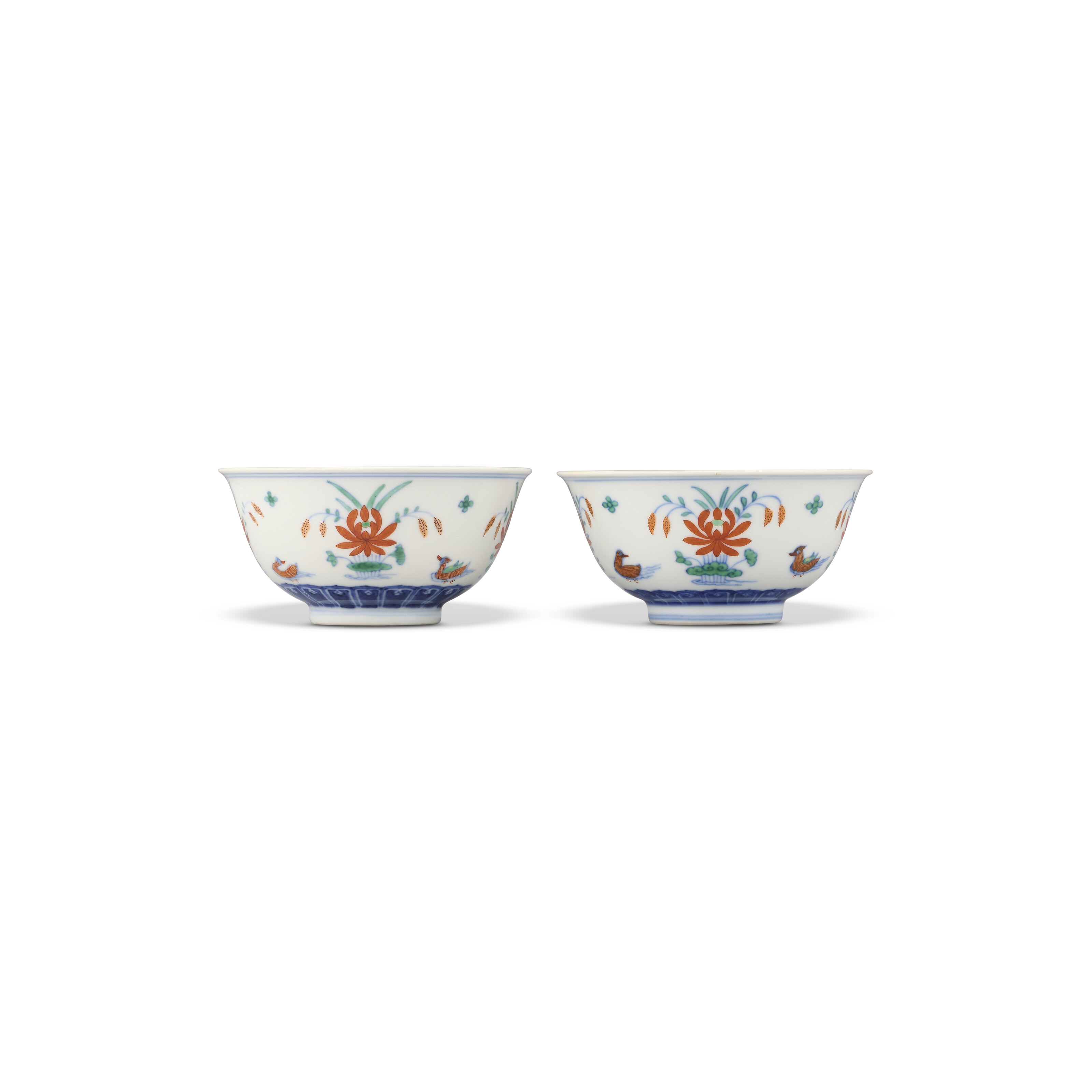 A PAIR OF DOUCAI 'MANDARIN DUCK AND LOTUS' BOWLS, QIANLONG SIX ...