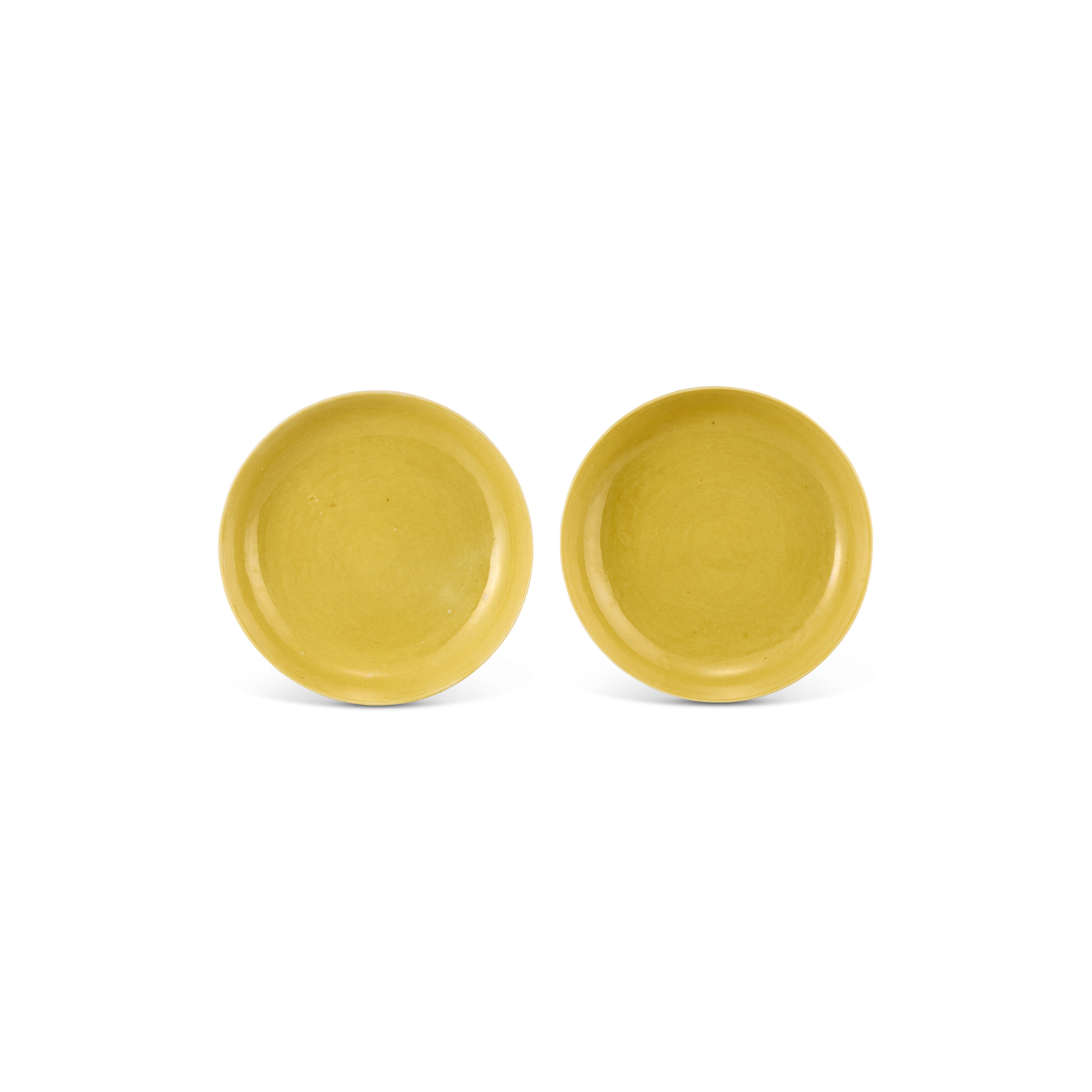 A RARE PAIR OF YELLOW-ENAMELLED DISHES, XUANTONG SIX-CHARACTER MARKS IN ...