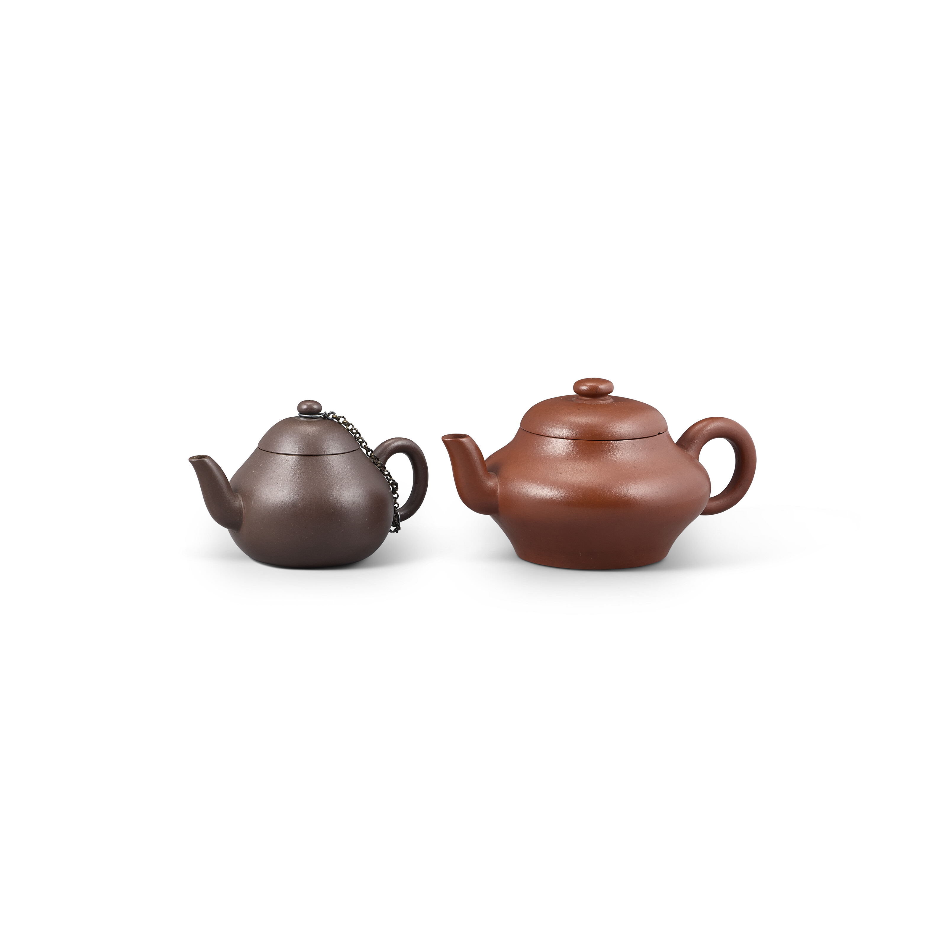 TWO YIXING TEAPOTS AND COVERS, QIANLONG PERIOD (1736-1795) | Christie’s