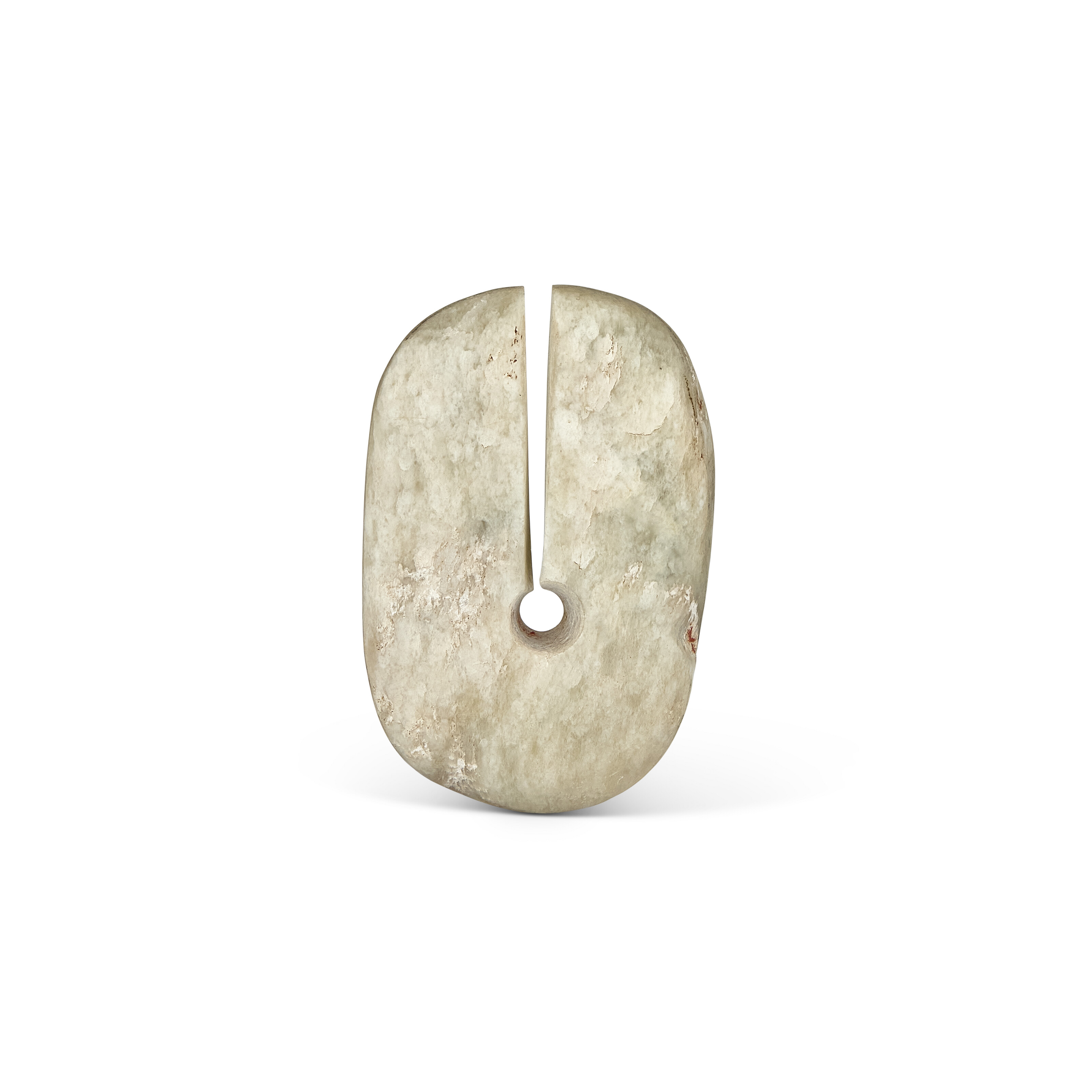A MOTTLED JADE SPLIT RING, CHINA, NEOLITHIC PERIOD, CIRCA 3500-2500 B.C ...