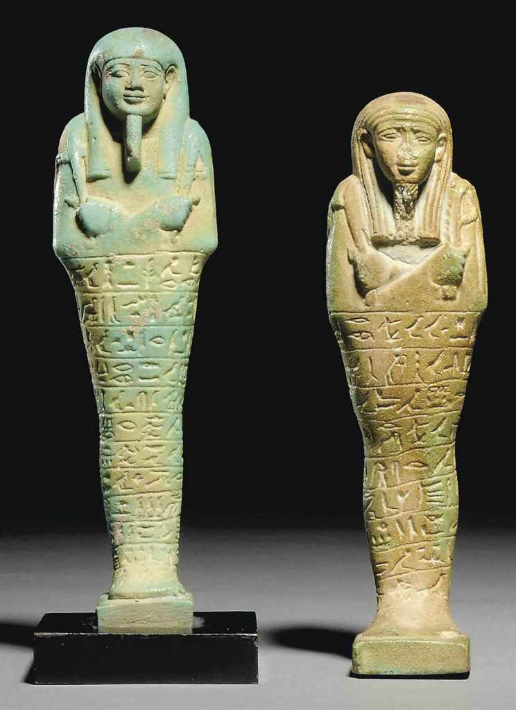 EGYPTIAN SHABTI a green glazed pottery - auctions & price archive