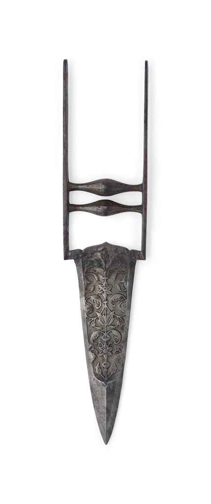 A CARVED WATERED-STEEL PUSH-DAGGER (KATAR) - auctions & price archive