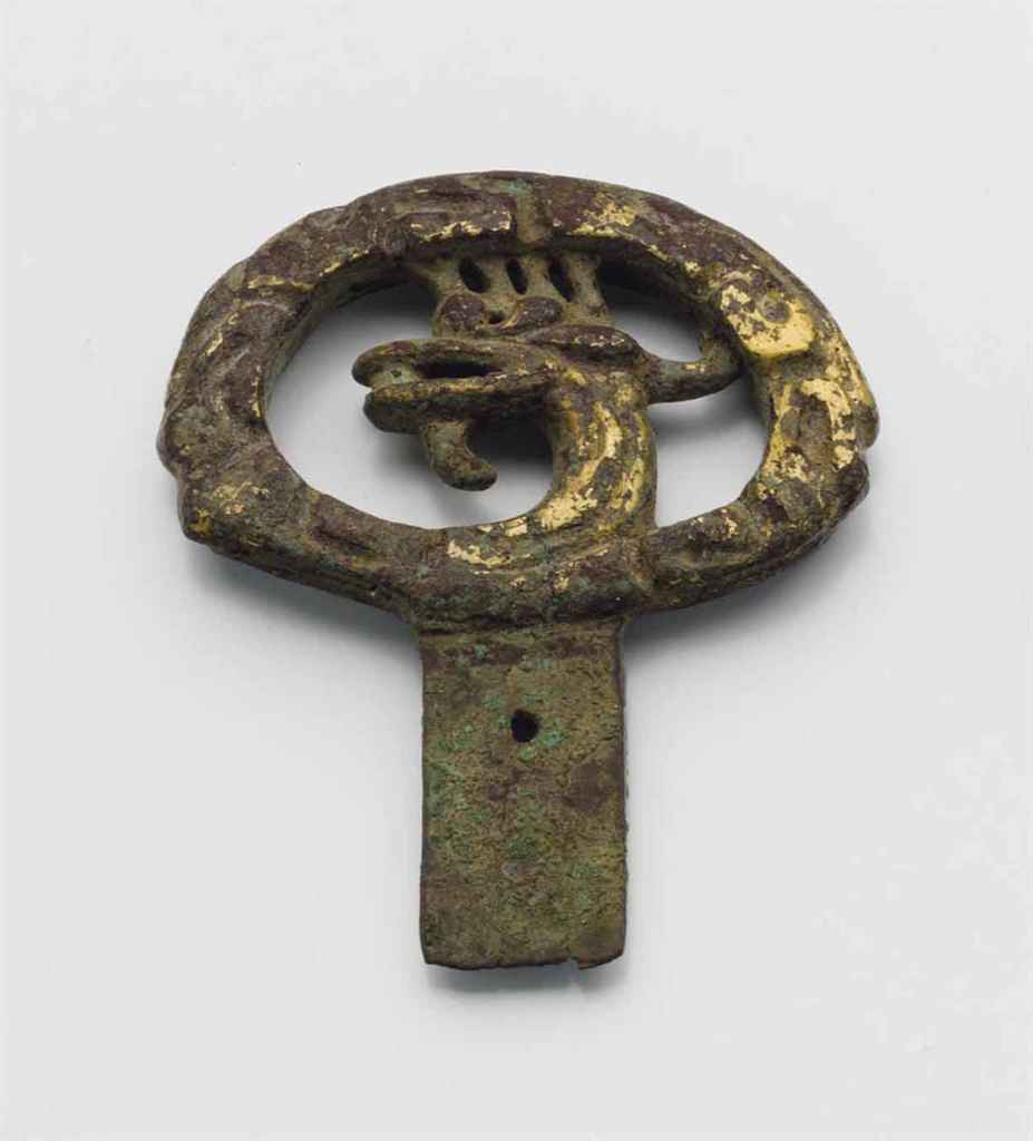 A gilt-bronze sword pommel - auctions & price archive