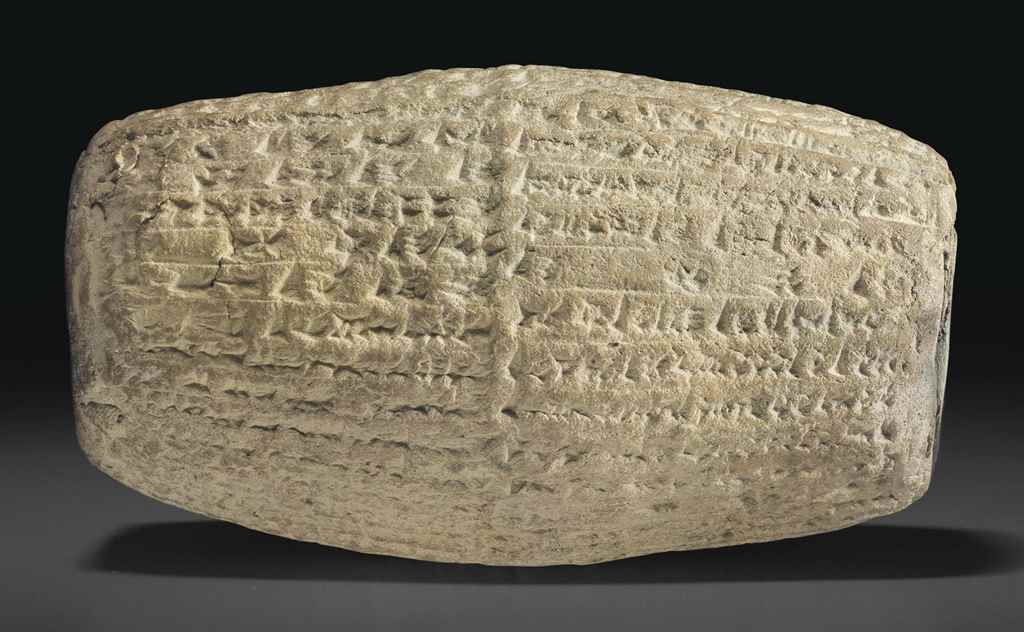 A Babylonian clay cuneiform brick of Nebuchadnezzar II, with three ...