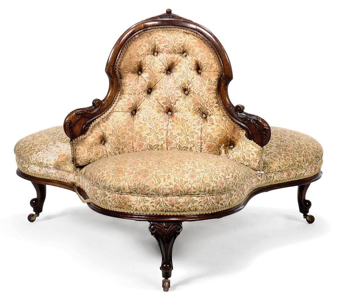A MID-VICTORIAN CARVED MAHOGANY CONVERSATION SOFA - THIRD QUARTER 19TH ...