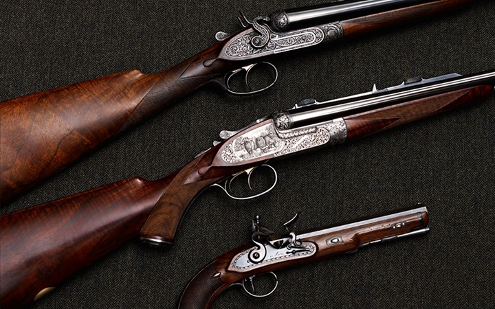 A VERY RARE FLINTLOCK OVER AND UNDER DOUBLE-BARRELLED SPORTING RIFLE