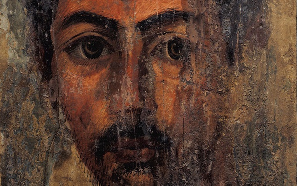 A ROMAN GILT-BRONZE BUST OF A DIOSCURUS