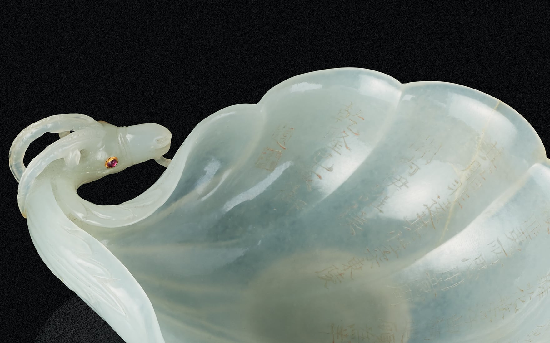 AN IBEX-HEADED CARVED JADE CUP