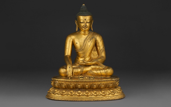 A highly important and rare bronze figure of Buddha
